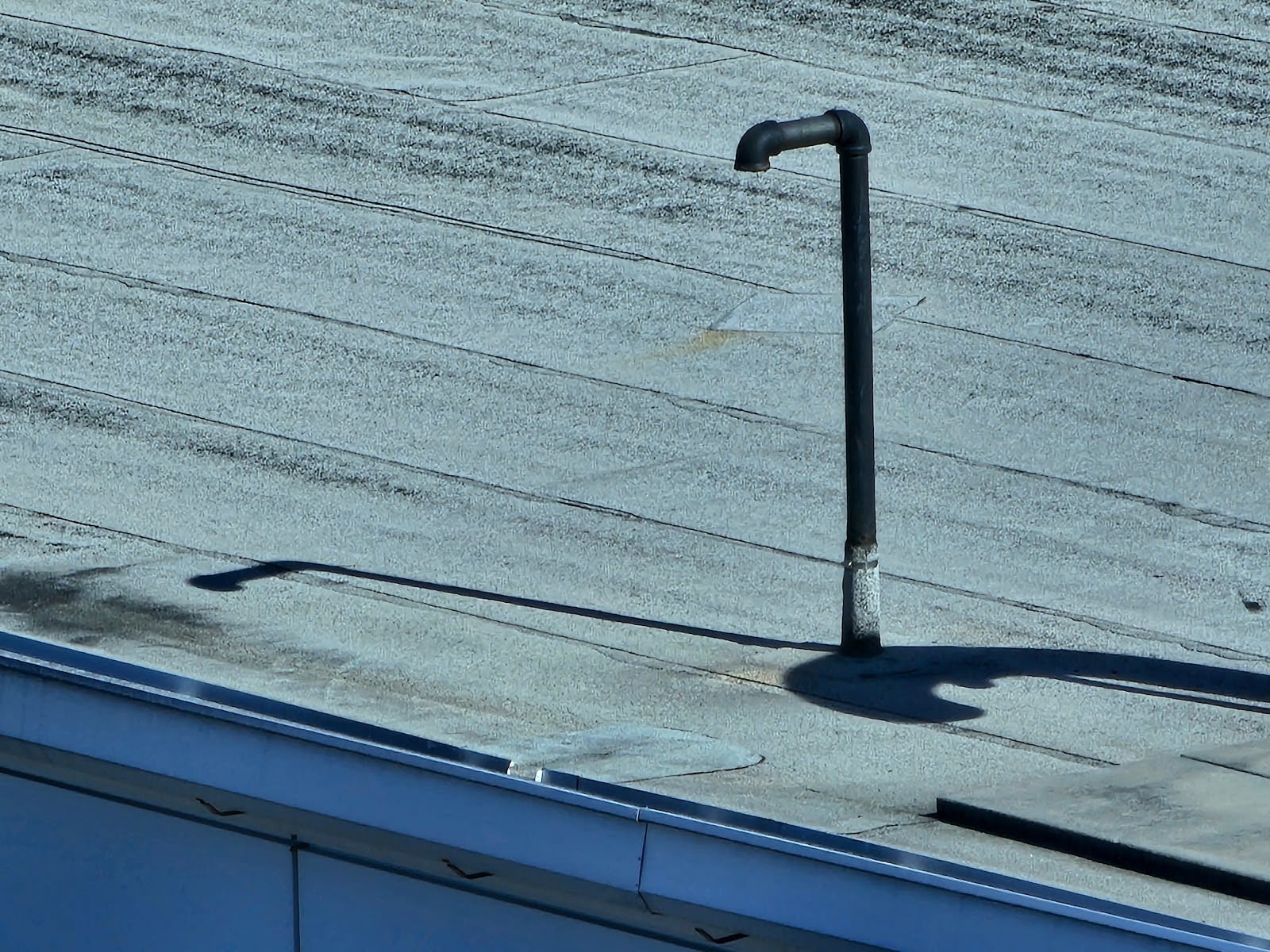 Goosenecks at Rooftop Pipe Penetrations - Dupont Roofing DC